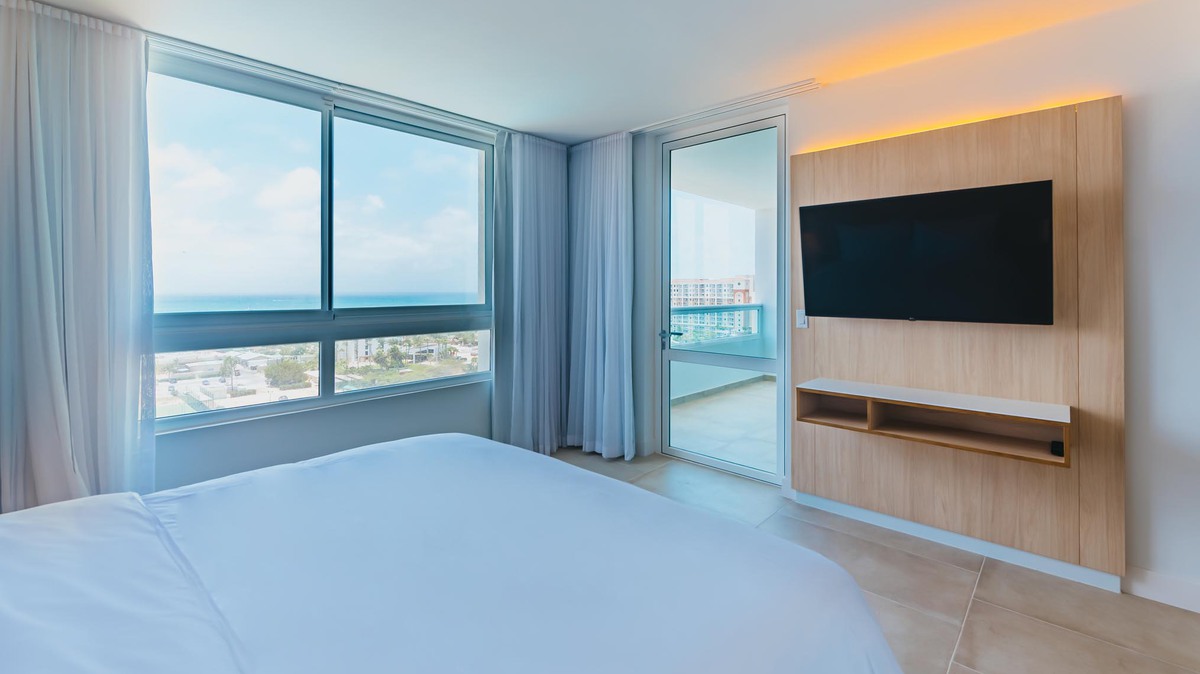 Open-Concept Ocean View Suite Featuring A Private Balcony & Two Full ...