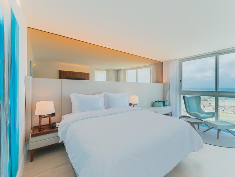 King bed with seating area and side table